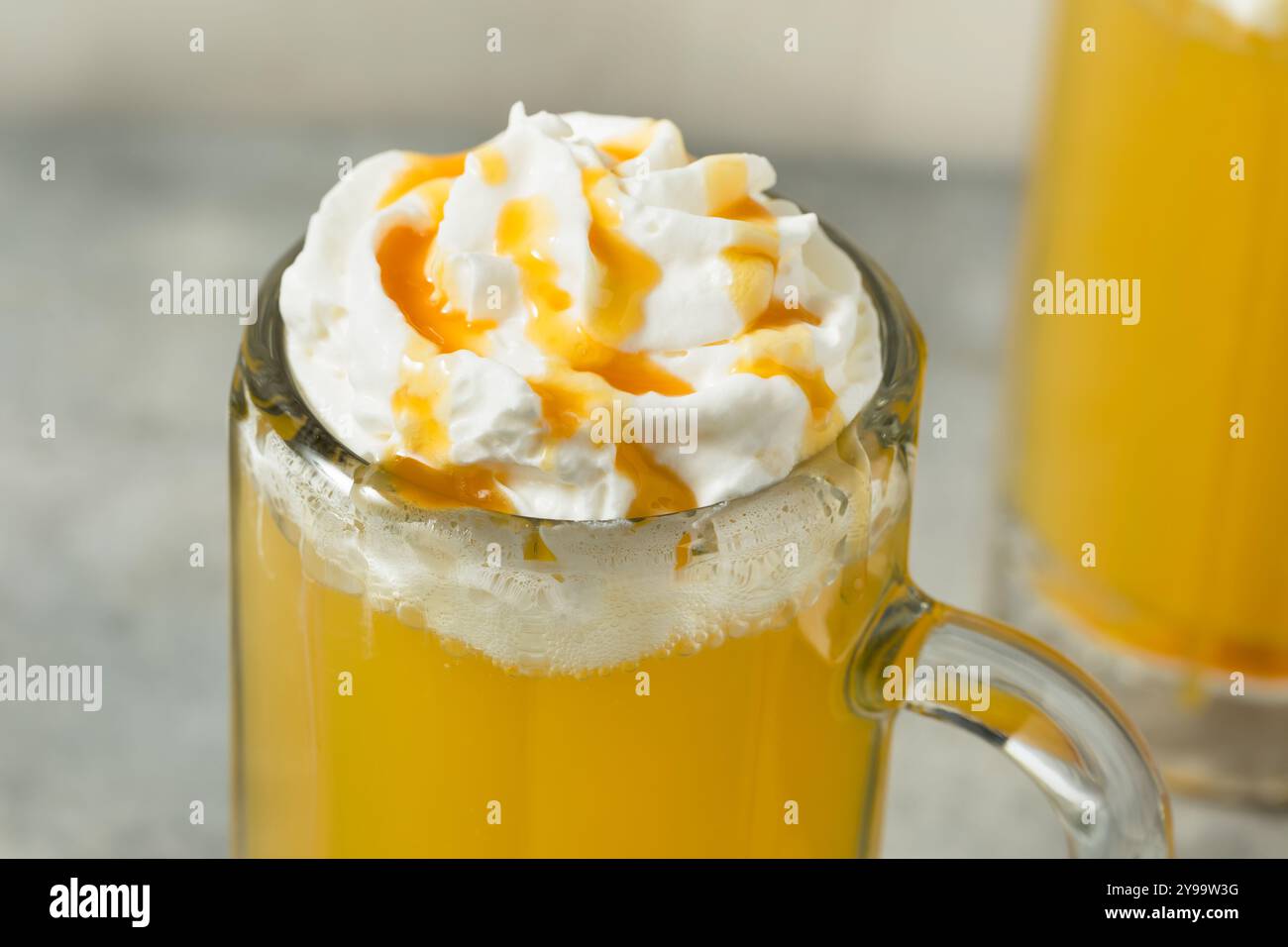Sweet Butterscotch Butter Beer Cocktail with Whipped Cream and Syrup ...
