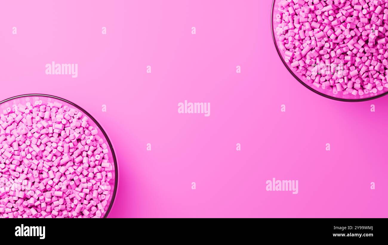 Top view on two glass cups with pink plastic polypropylene granules ...