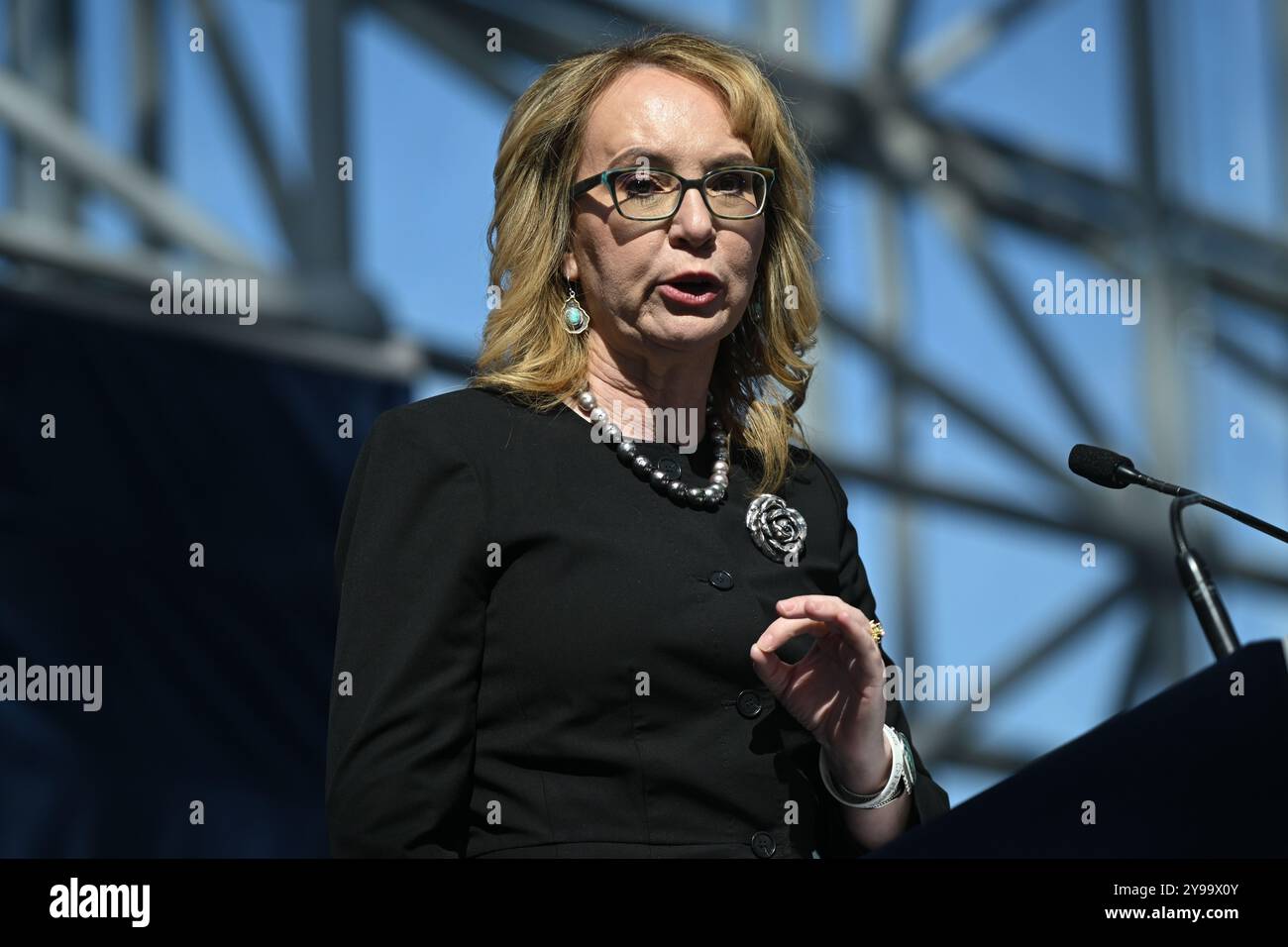 Former representative Gabby Gifford signs gun safety legislation at the ...