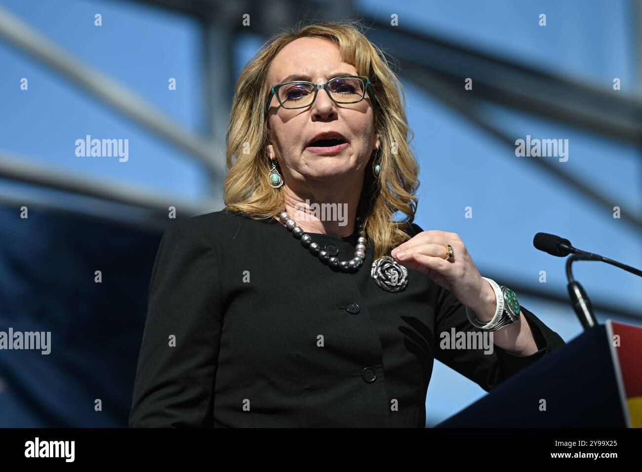 Former representative Gabby Gifford signs gun safety legislation at the ...