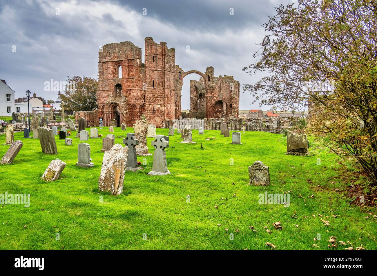The image is of the medieval ruined abbey of Lindisfarne Priory on Holy ...