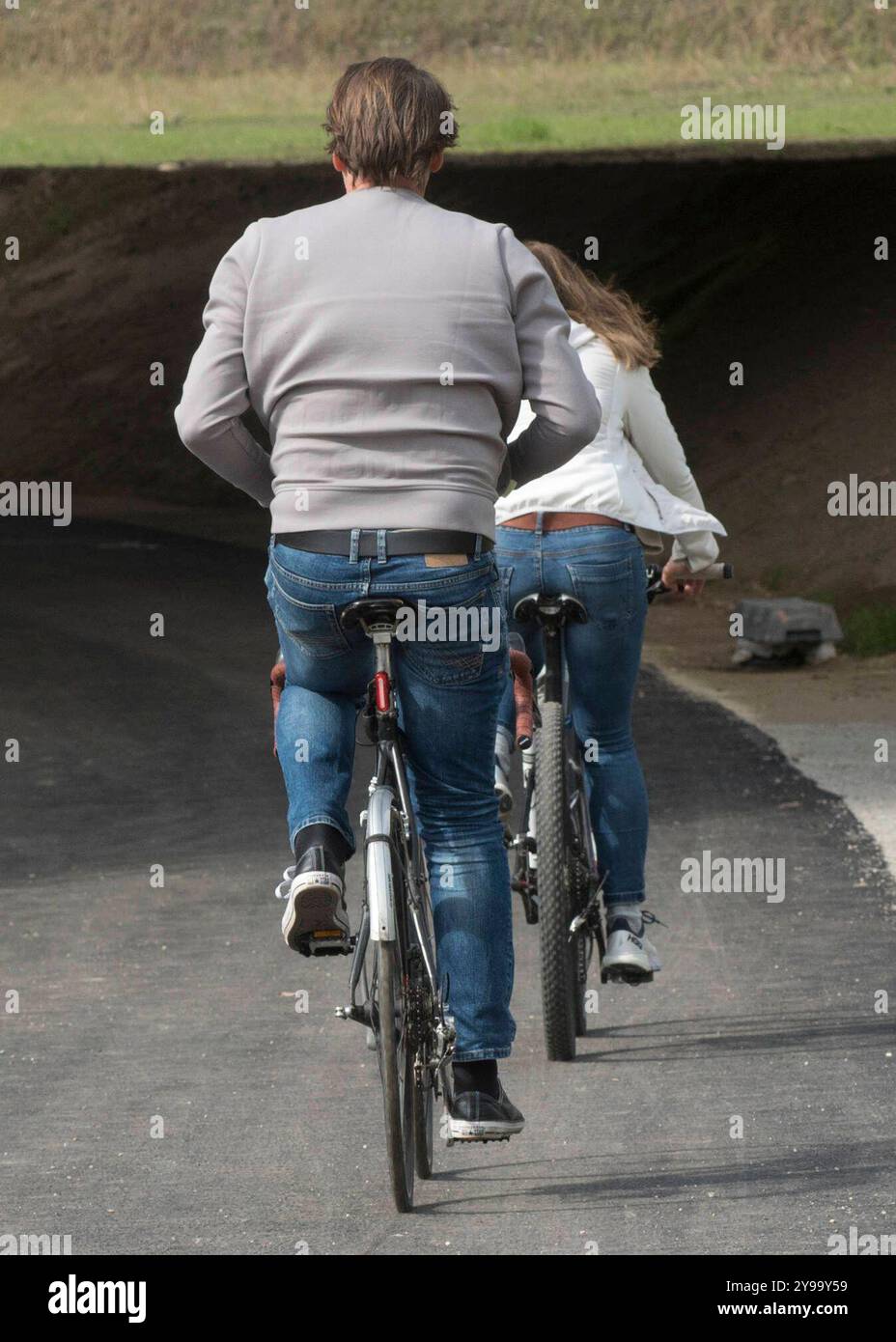 couple doing an outdoor activity together, spending time with another ...