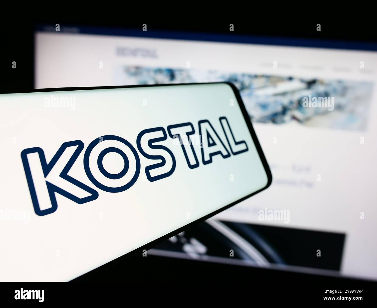 In this photo illustration, a mobile phone with the logo of German ...