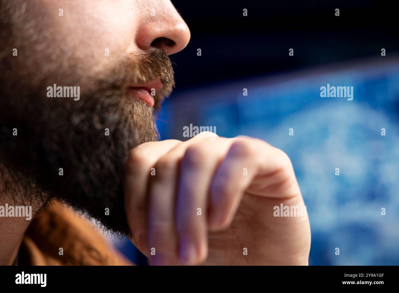 Focus on computer technician using PC in blurry background to do ...