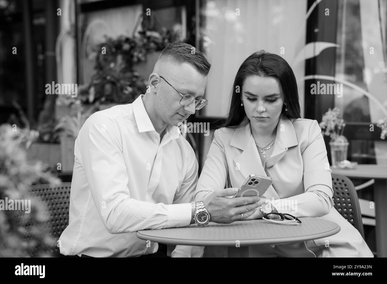 Intimate Digital Conversation Over Coffee in a Cozy Cafe Setting Stock ...