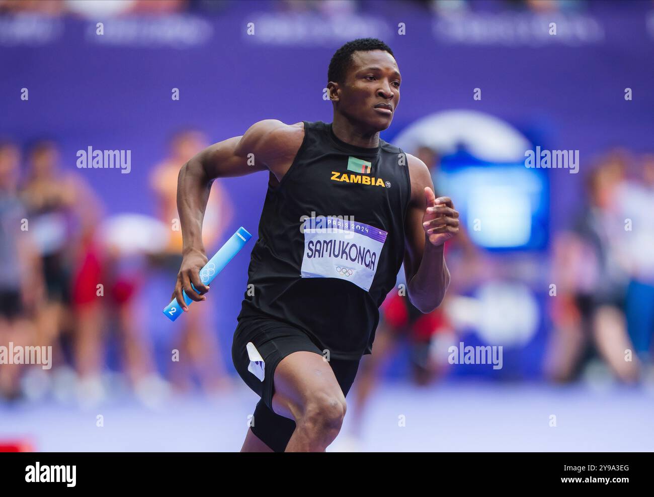 Muzala Samukonga participating in the 4X400 meters relay at the Paris ...