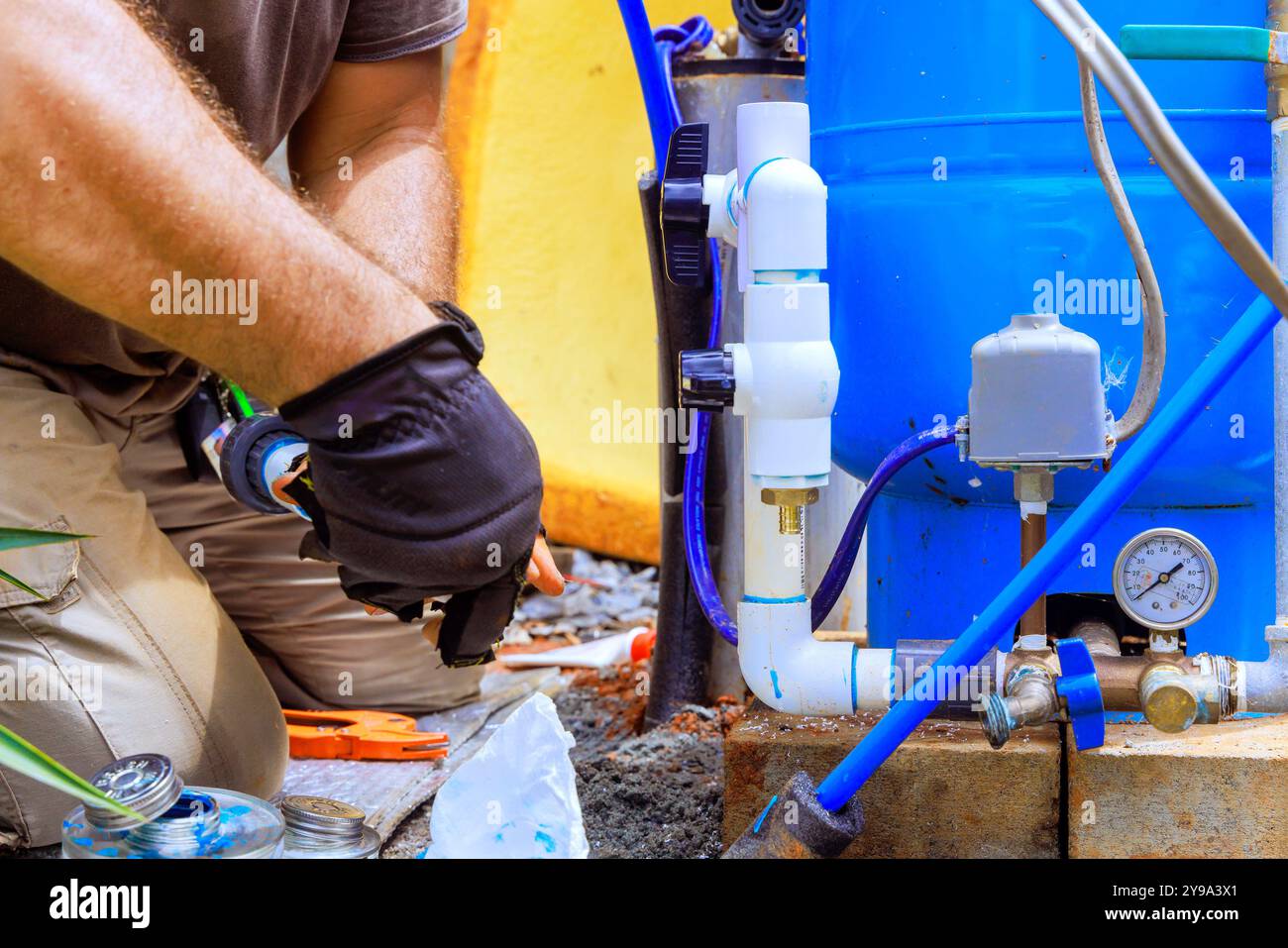 Assembling connection between water well home water system Stock Photo ...