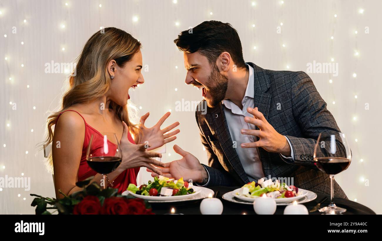 Angry couple arguing during romantic dinner in restaurant Stock Photo ...