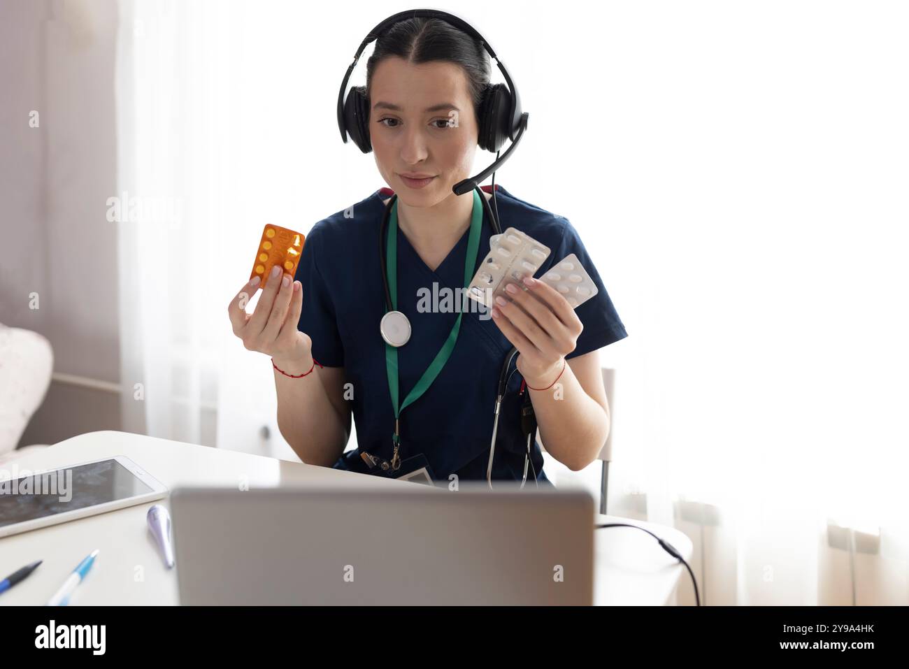 Caucasian doctor speaking remotely patient hi-res stock photography and ...
