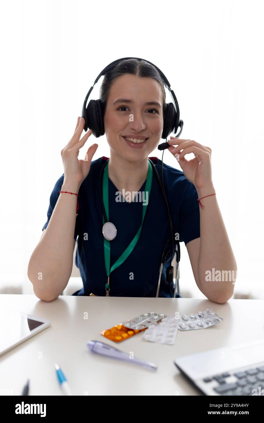 Woman in headphones talking online hi-res stock photography and images ...