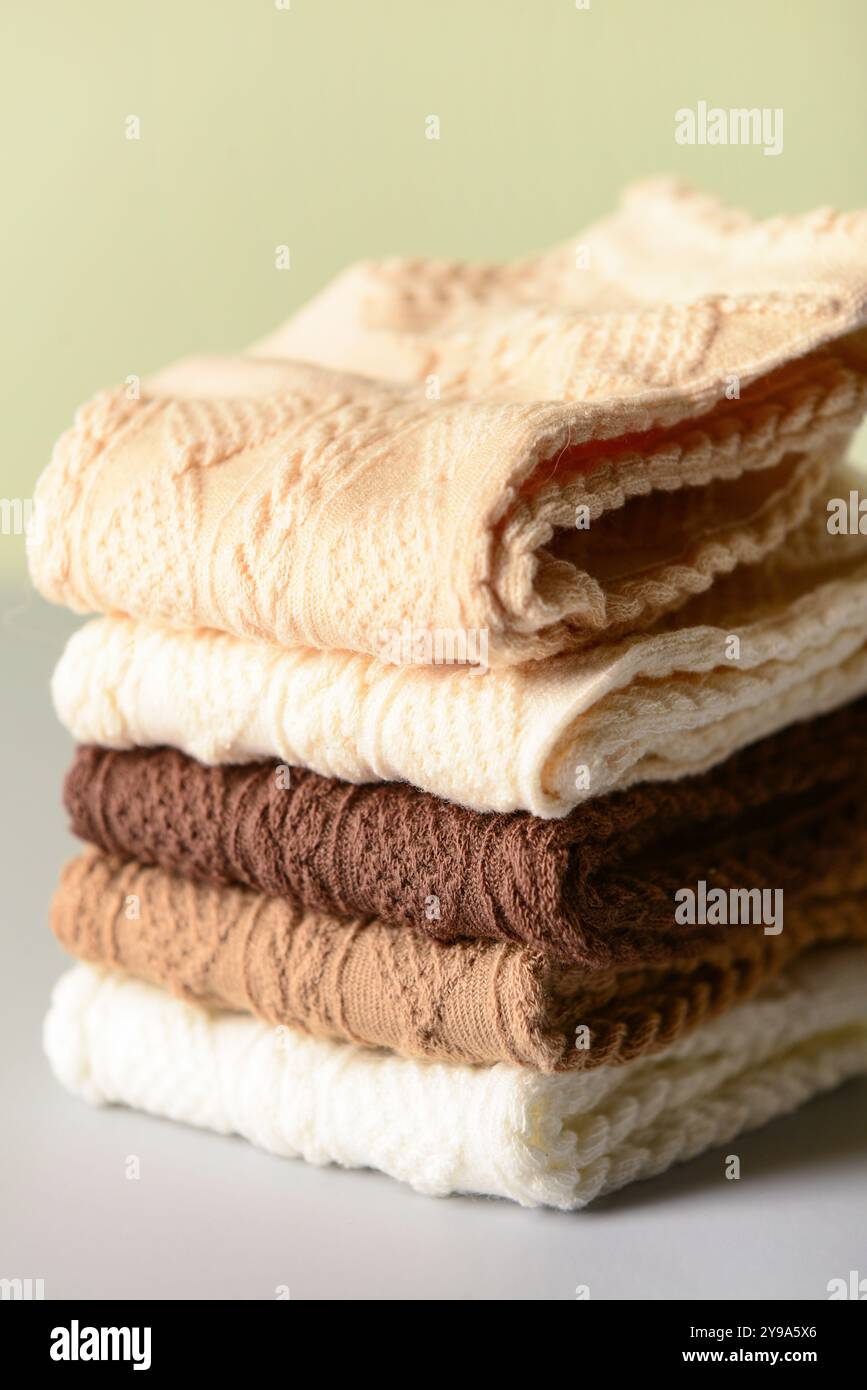Stack of basic color socks on grey table Stock Photo - Alamy