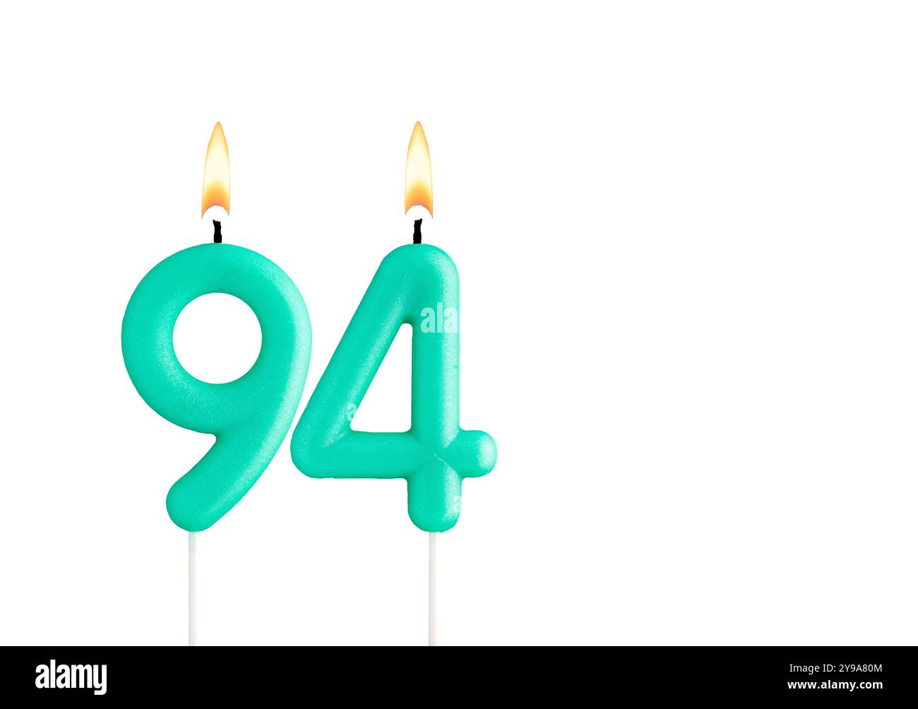 Birthday number 94 - Green birthday candle on white background Stock ...