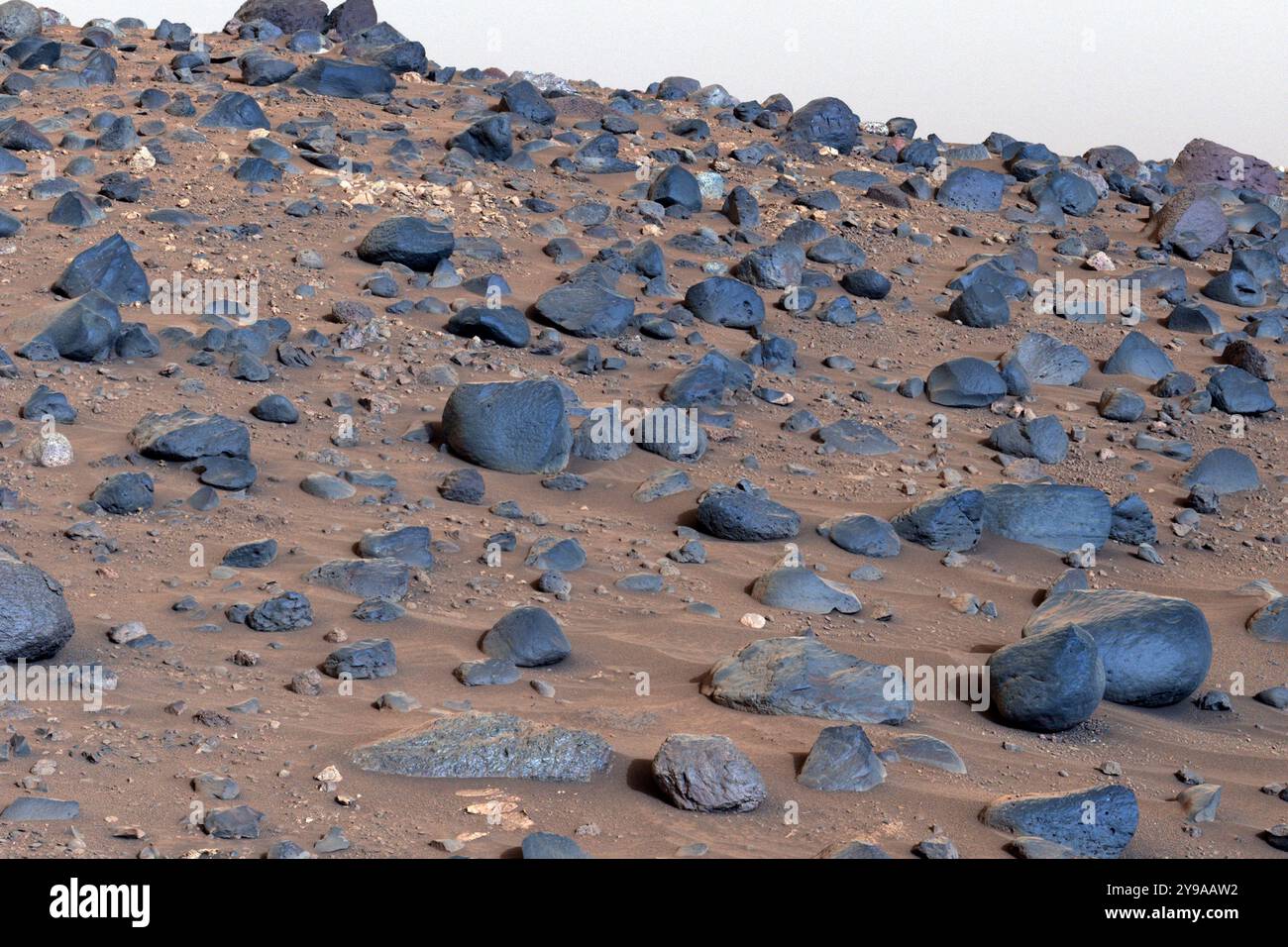 Composed of 18 images, this mosaic shows a boulder field on "Mount ...