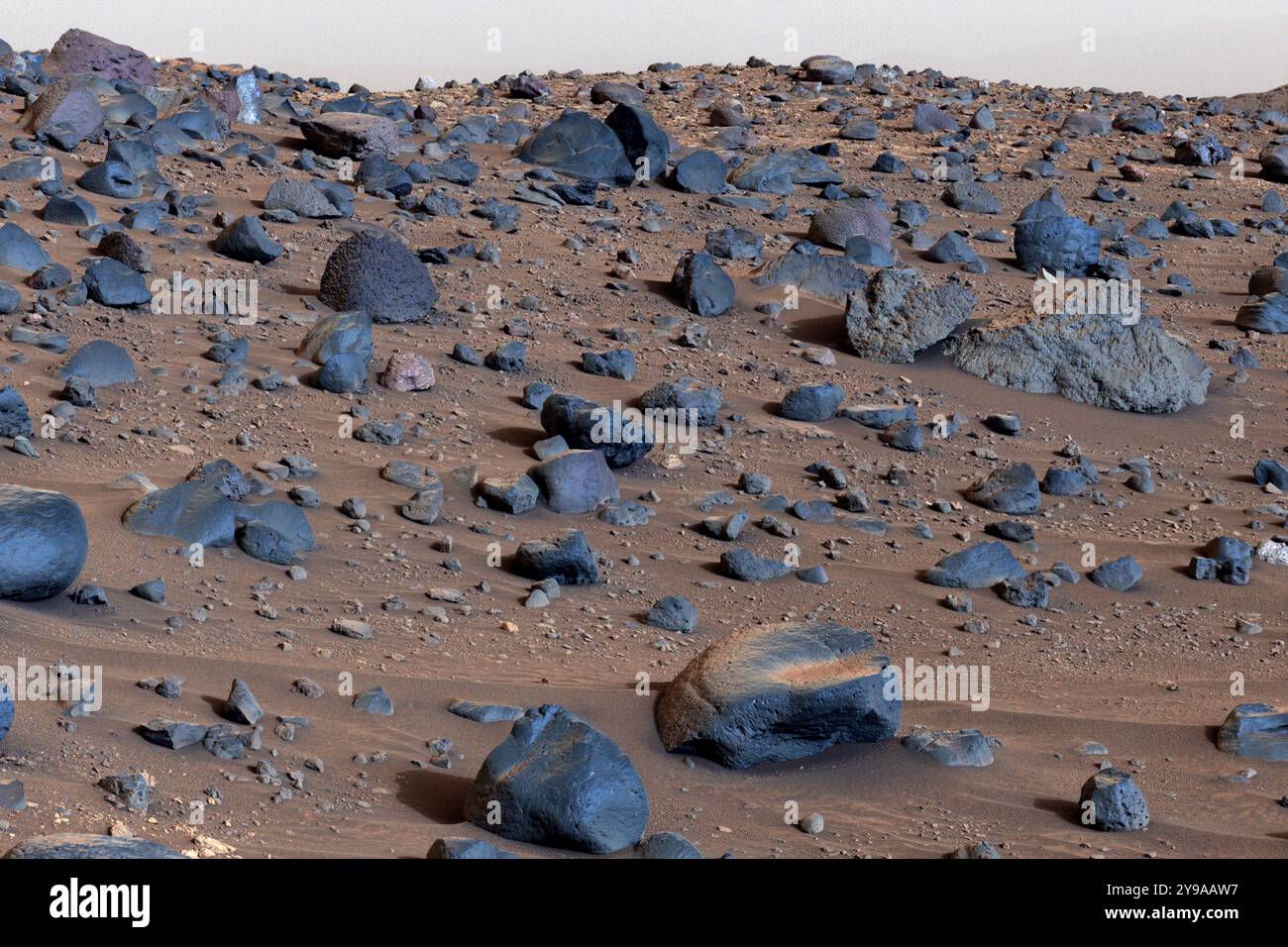 Composed of 18 images, this mosaic shows a boulder field on "Mount ...