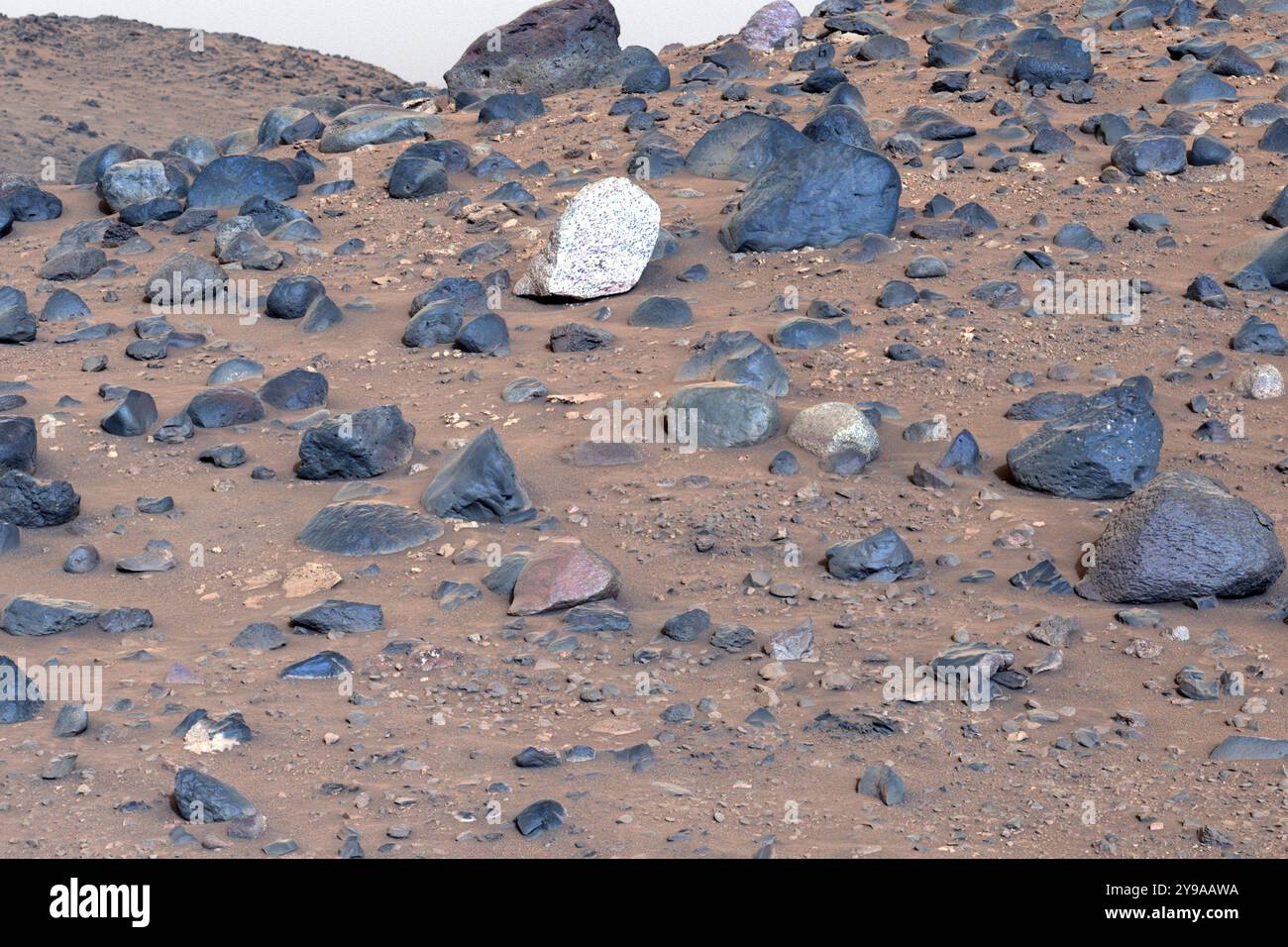 Composed of 18 images, this mosaic shows a boulder field on "Mount ...
