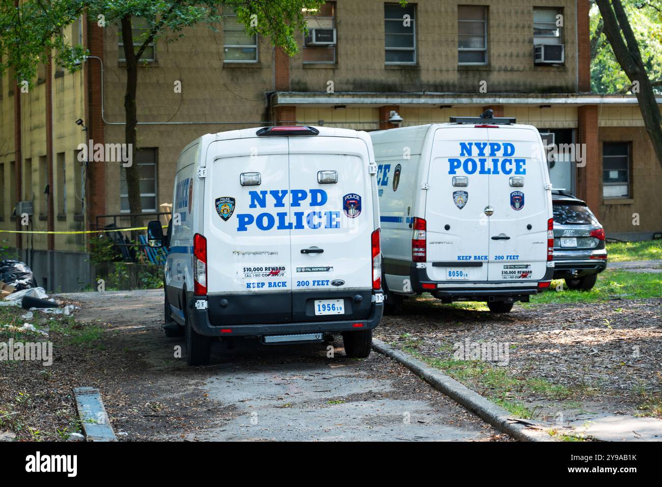 NYPD vans parked outside a special precinct at the Parade Grounds in ...