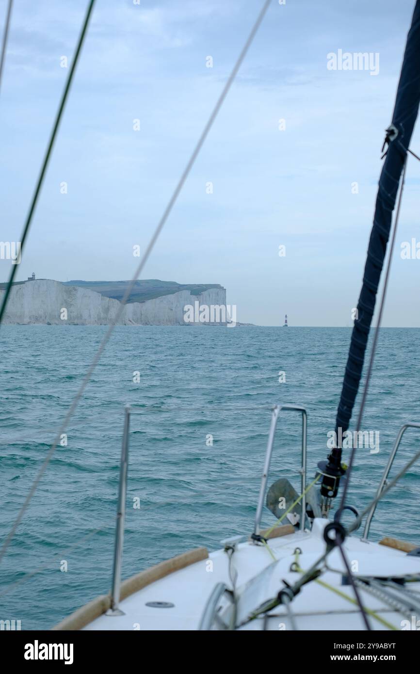 Sailing along the South Coast of the UK, with white cliffs and yacht ...