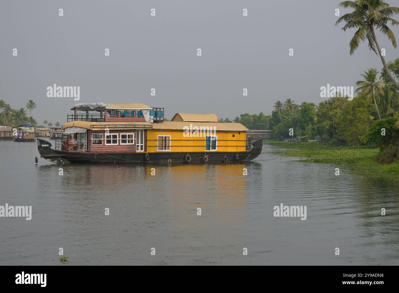 Houseboat in Kerala backwater sailing through the canals in Alappuzha ...
