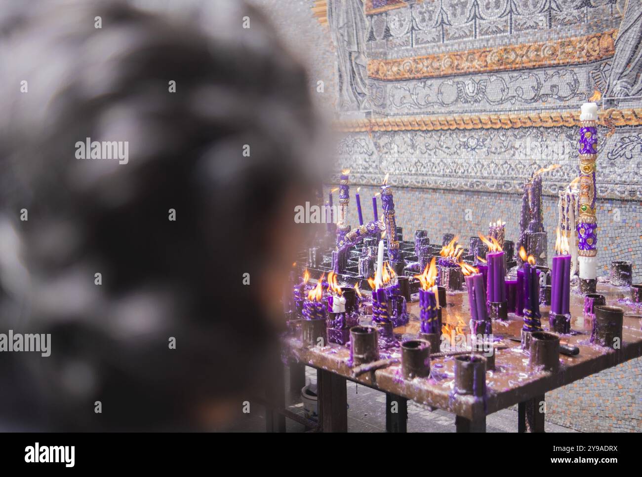 Group of handmade and ornamental candles lit by the Lord of Miracles in ...