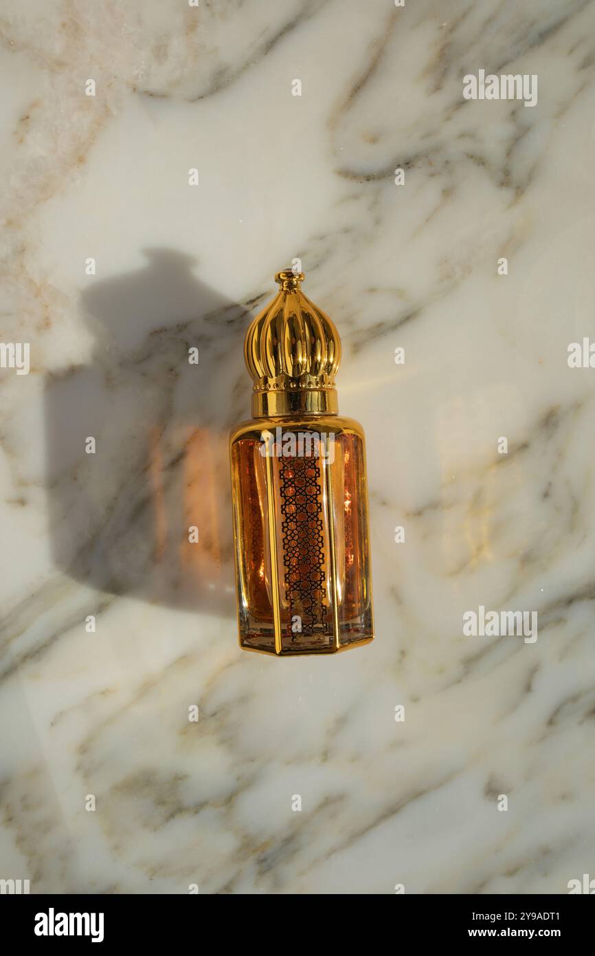 Arabian perfume bottle on marble Stock Photo - Alamy