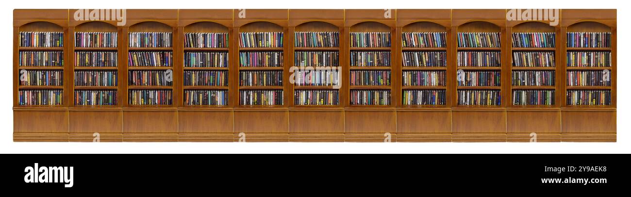 Line of Wooden straight top bookcase full of a variety of books Stock ...