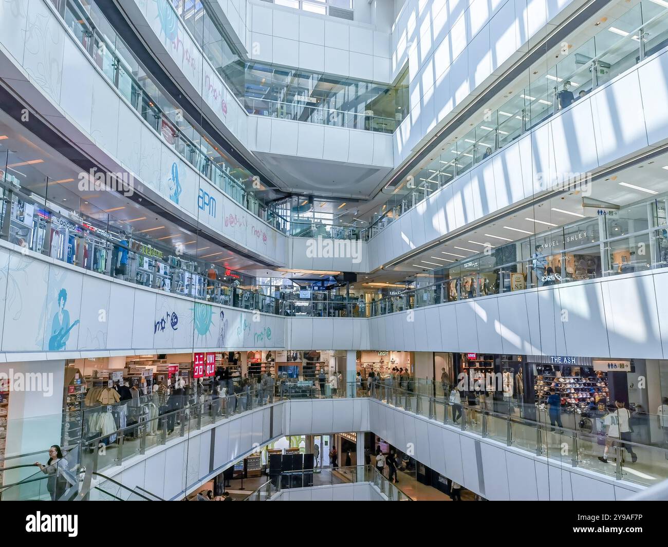 Hong Kong, China, October 08, 2024: A multi-level shopping mall with ...