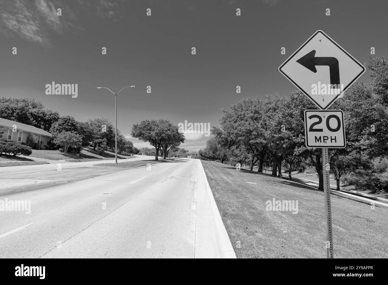 road sign of 20 mph and turning signal. caution yellow roadsign ...