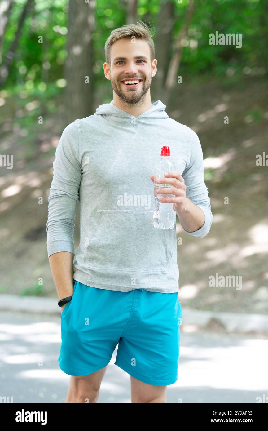 Hydration vitality. Be hydrated. Thirsty sportsman. Man hold mineral ...