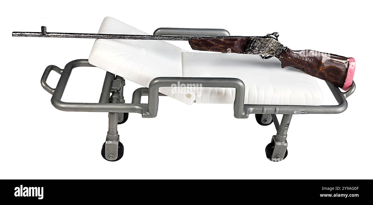 Simple wooden rifle for shooting on a hospital gurney to show gunfire ...