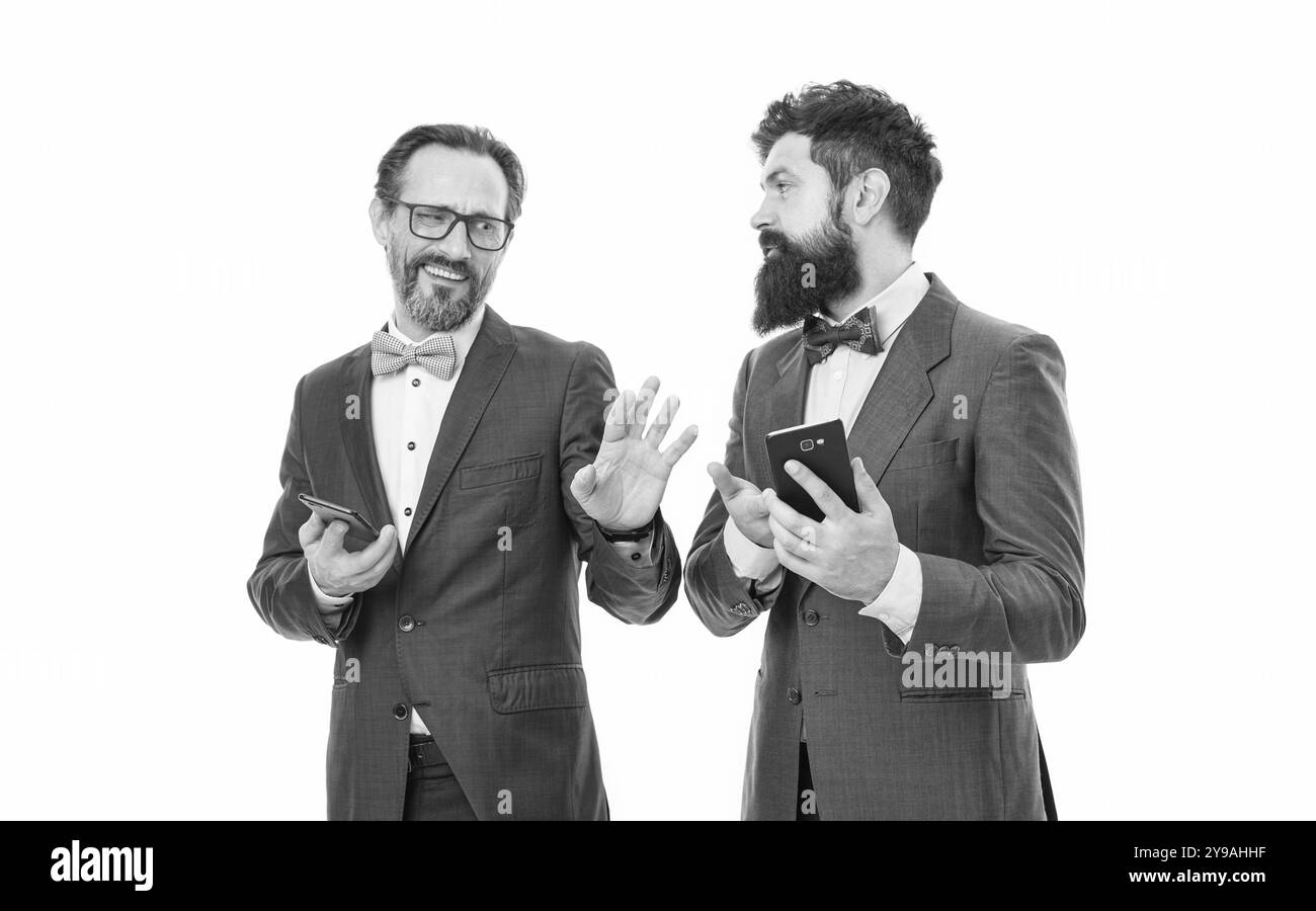mature men. Agile business. partnership of men speaking on phone ...