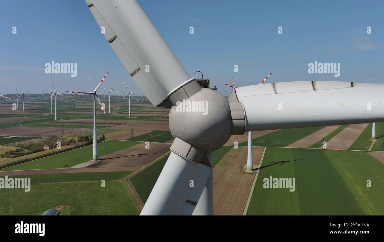 Aerial view of wind turbines and agriculture fields. Windmills turbines ...