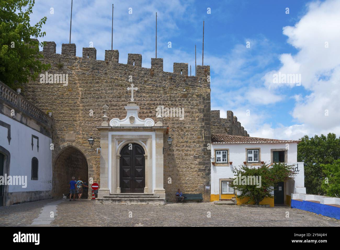 Fortress with adjoining church entrance and stone walls, Porta da Vila ...