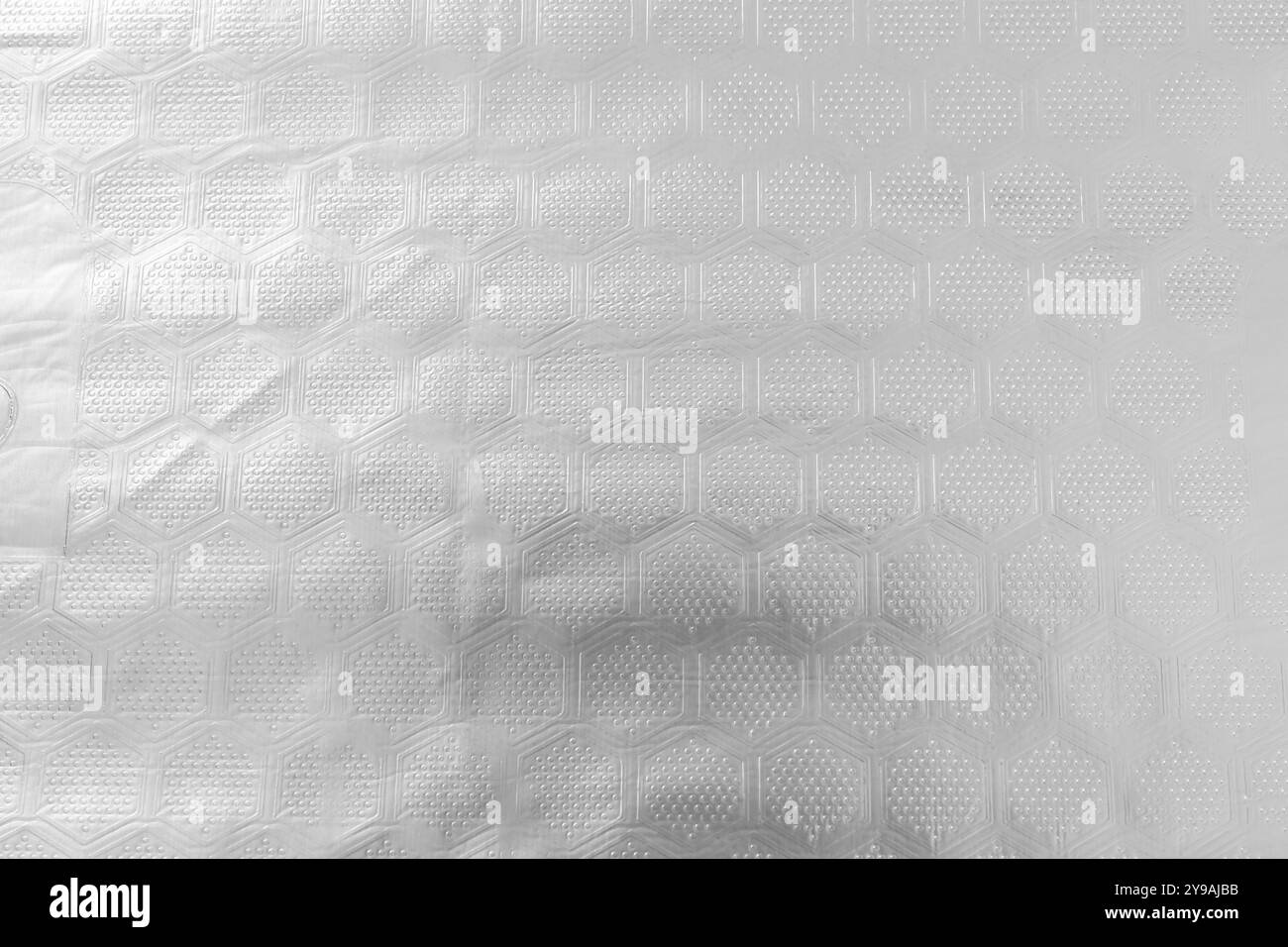 Shiny silver tinfoil surface as background, top view Stock Photo - Alamy