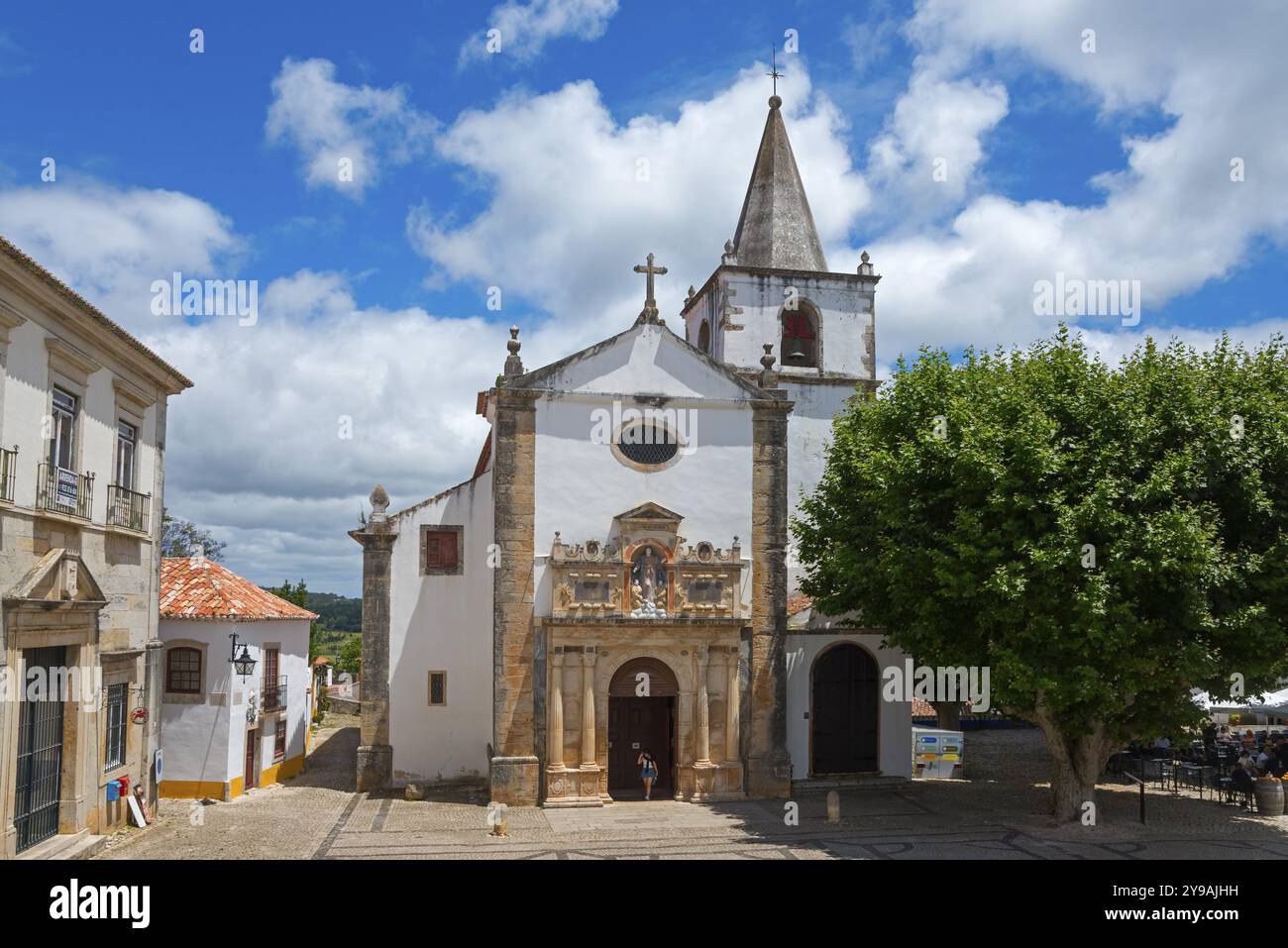 Church with Gothic-Baroque elements and high tower under a sunny ...