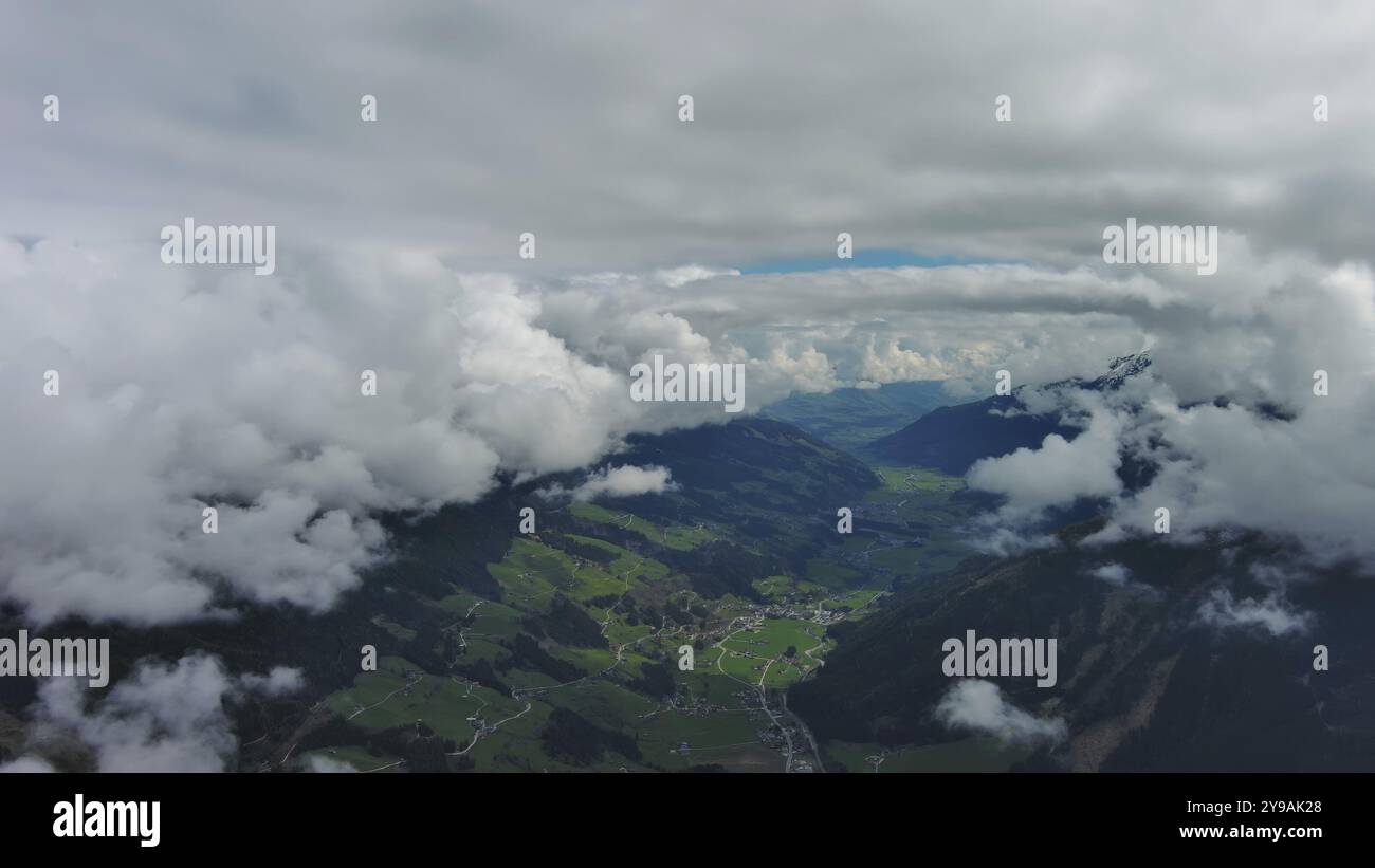 Aerial view of village in valley and mountain in Austrian Alps, Austria ...