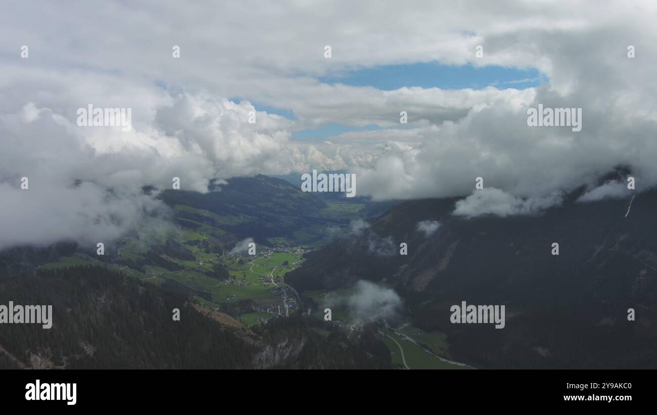 Aerial view of village in valley and mountain in Austrian Alps, Austria ...
