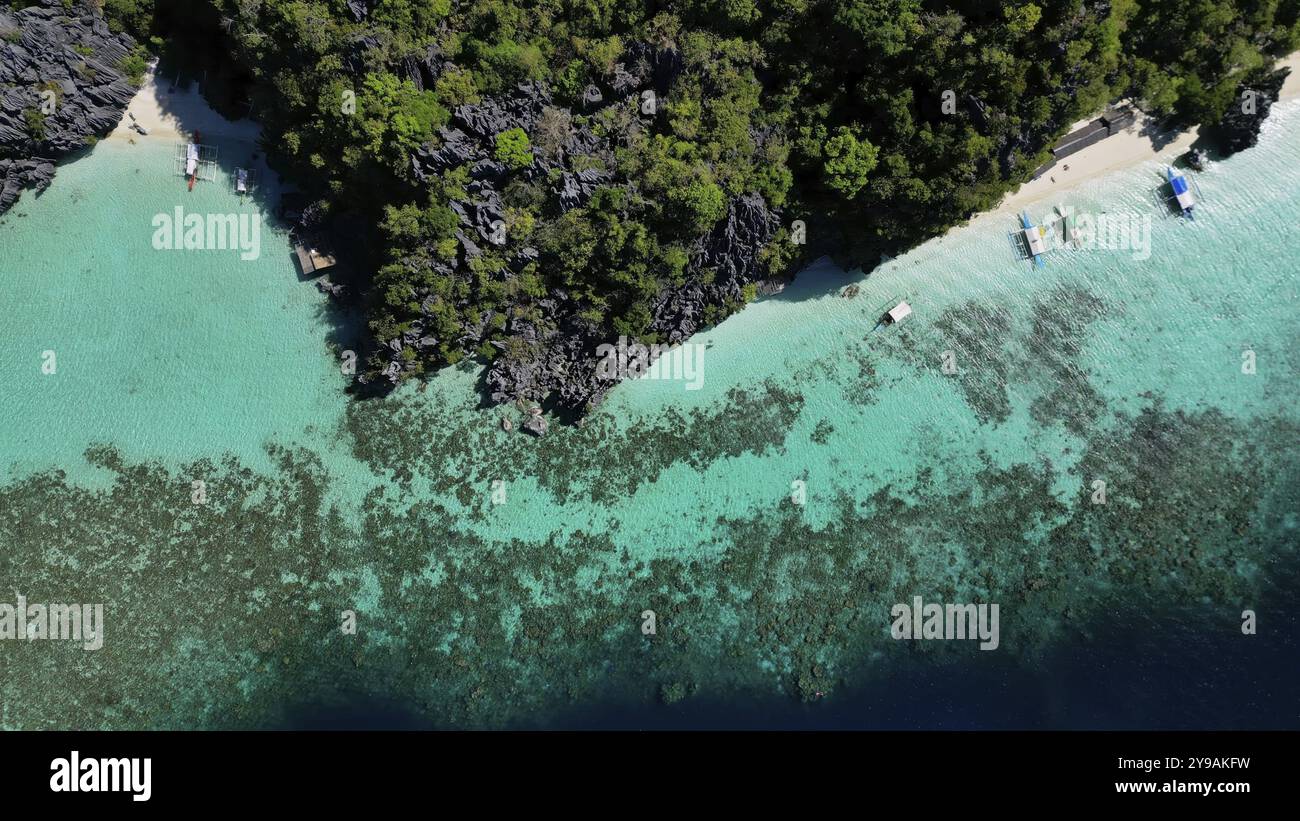 Aerial view of tropical Philippines island. White sand beach, rocks ...