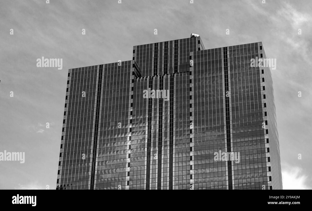 skyscraper with glassy facade. modern glass building. skyscraper in ...