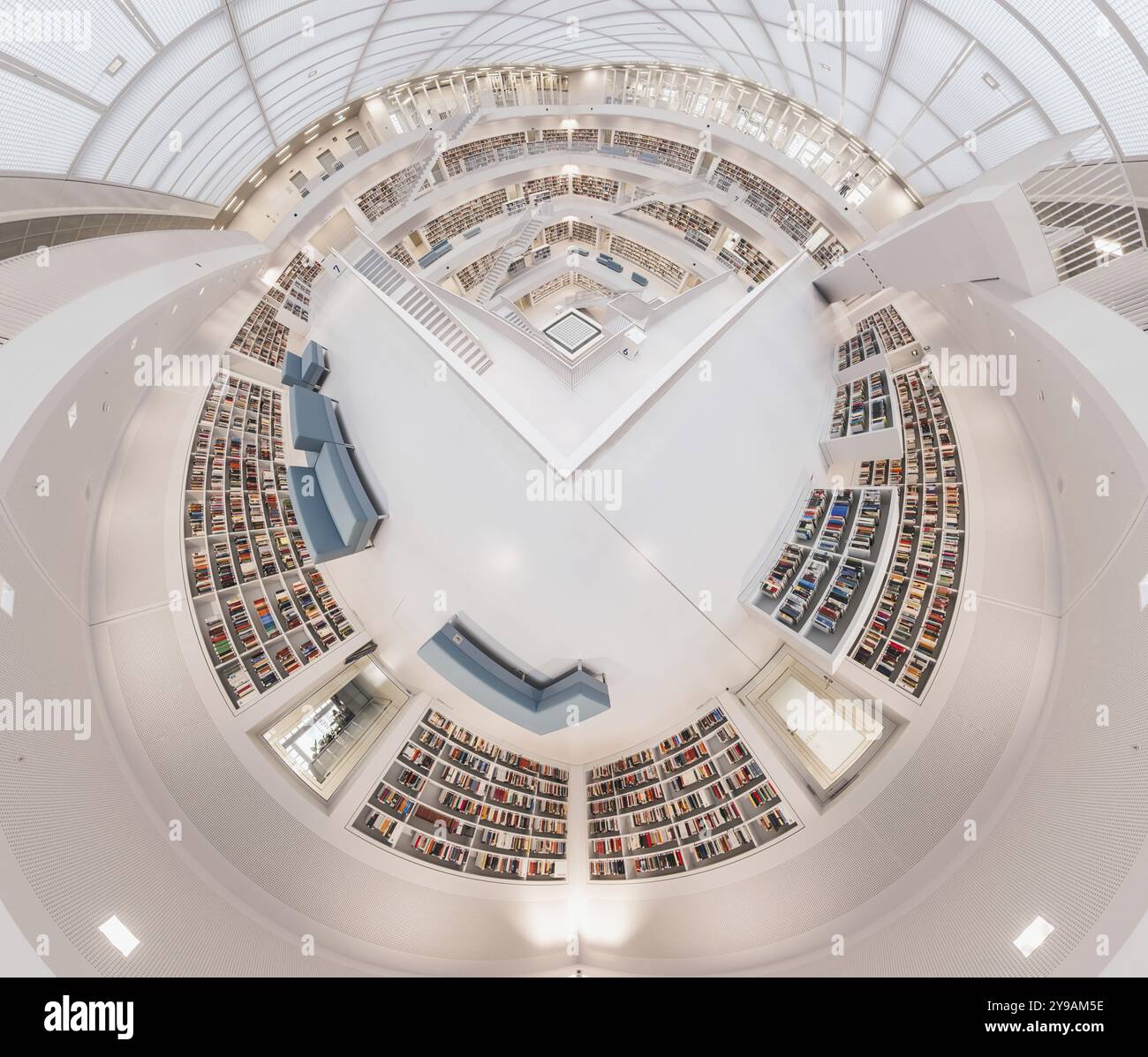 Modern library with symmetrical design and numerous bookshelves in a ...