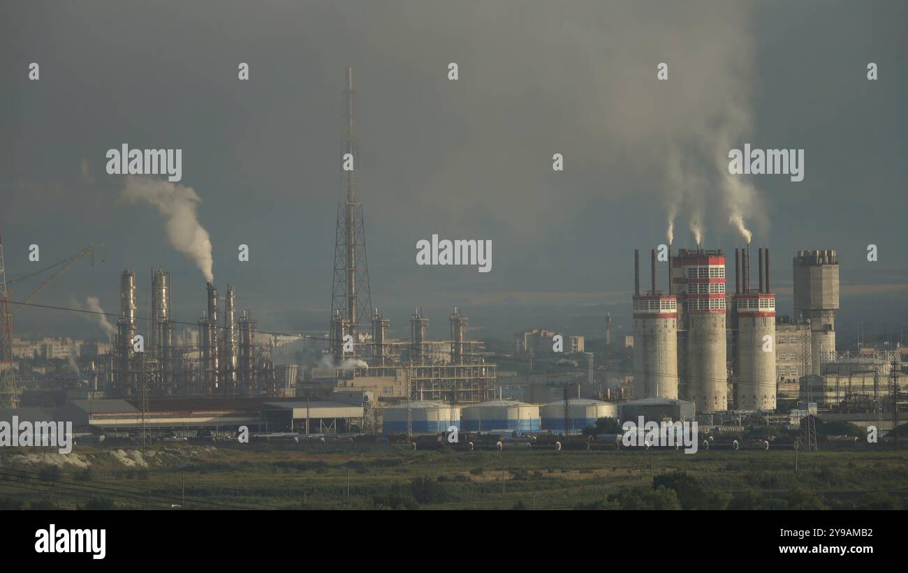 Oil and gas refinery plant with chimney smoke, Business petrochemical ...