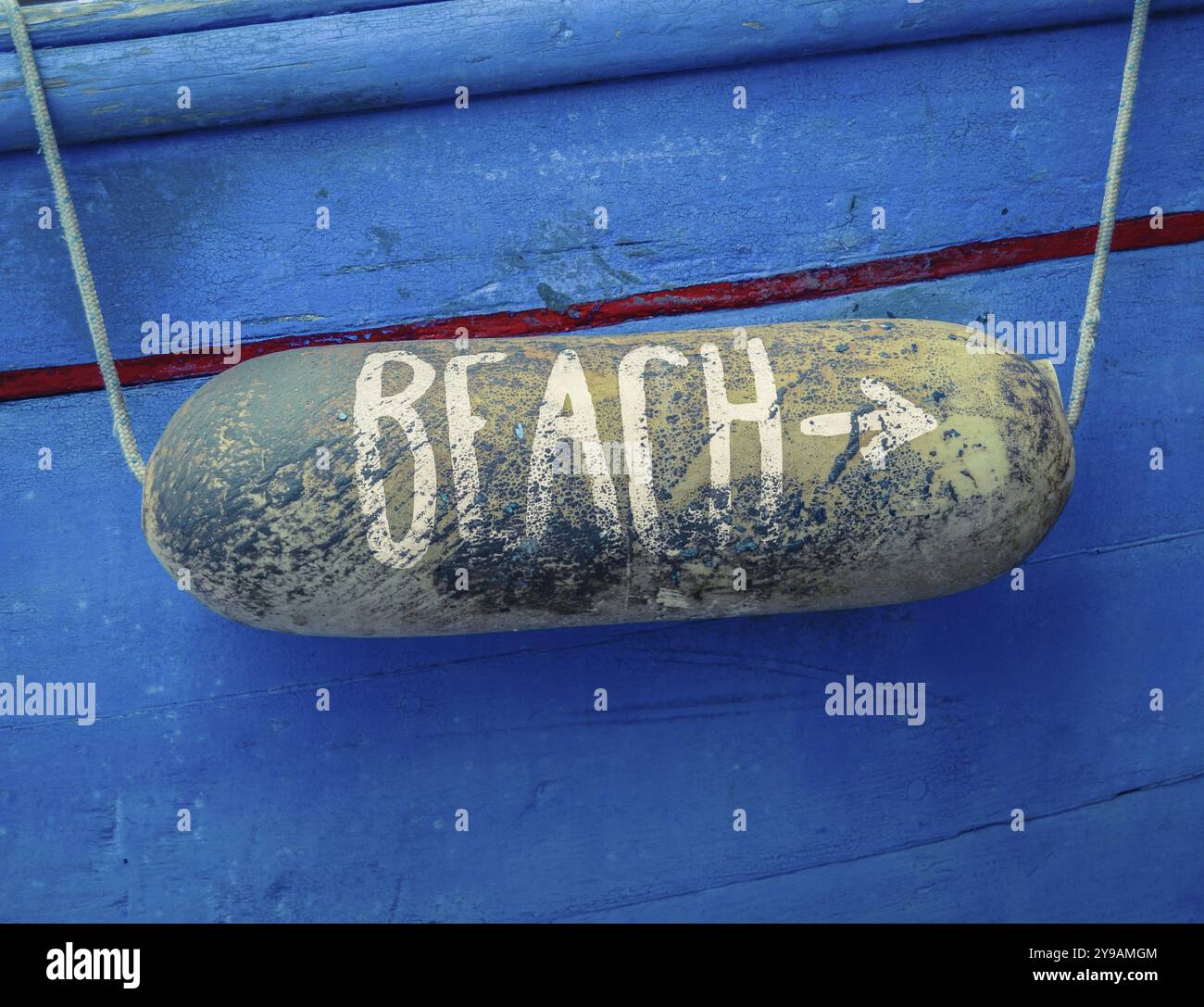 Retro Rustic Sign For A Beach On A Buoy On Of An Old Blue Boat Stock ...