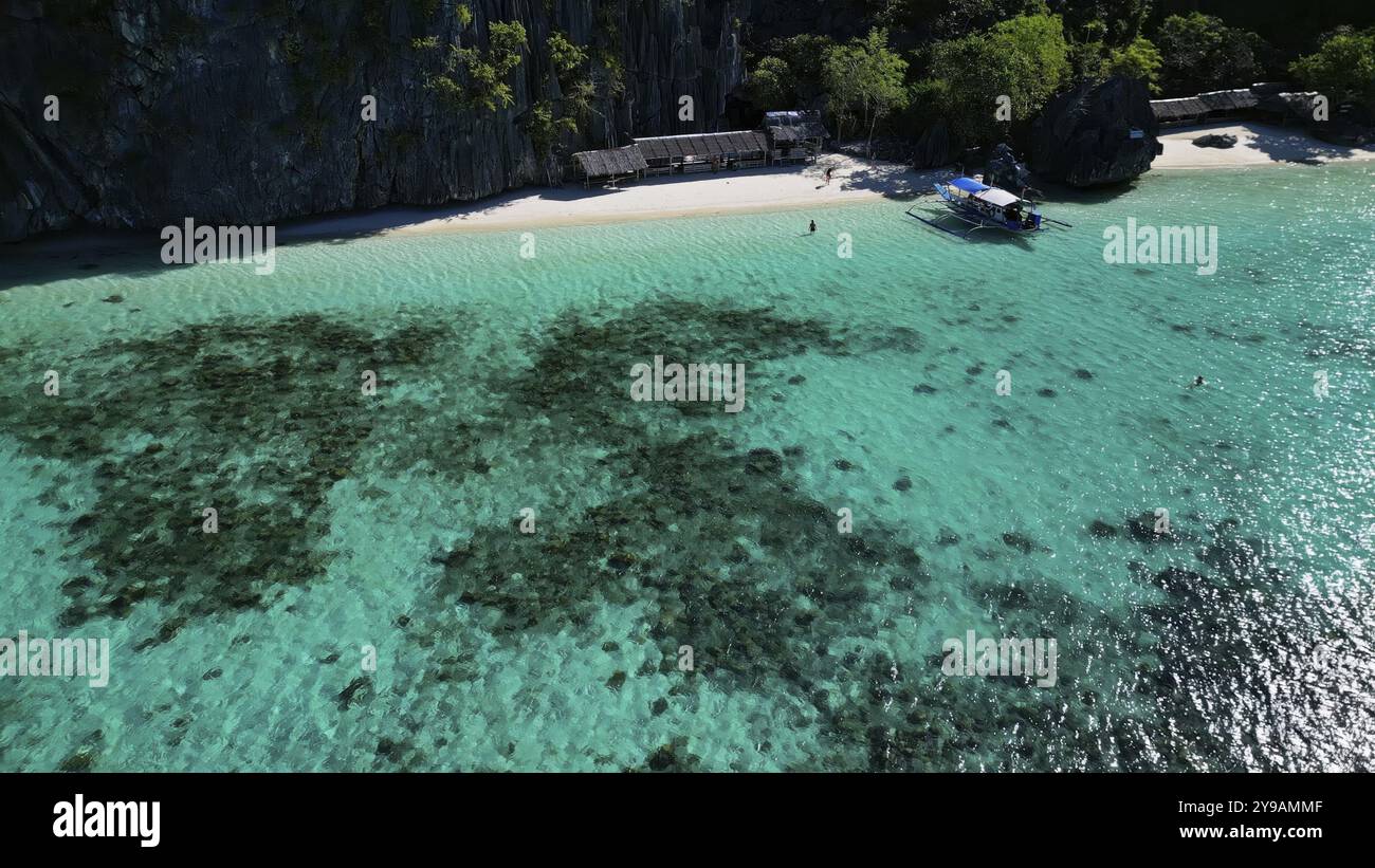 Aerial view of tropical Philippines island. White sand beach, rocks ...