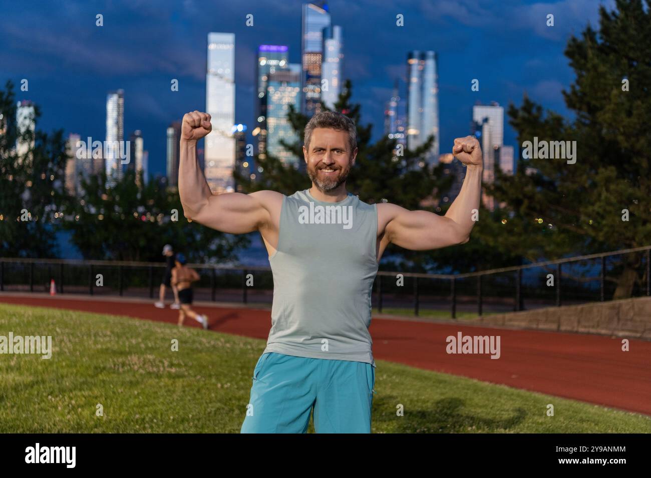 Biceps concept. Athlete show biceps and triceps. Man flex arms with ...
