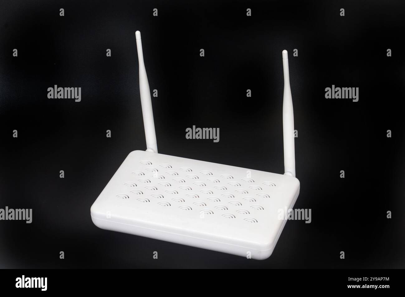 white internet modem with two antennas on a black screen Stock Photo ...