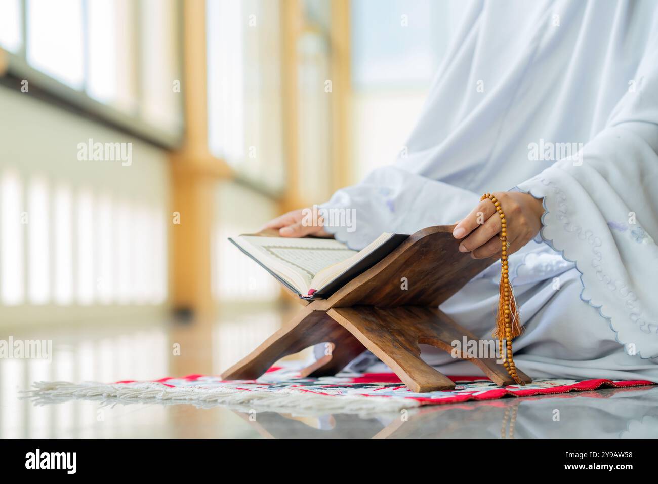 Islamic concept - The Holy Al Quran with written Arabic calligraphy ...