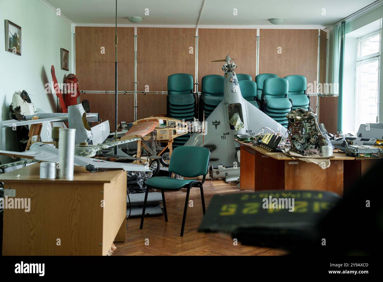 Parts of downed Shahed drones launched by Russia are piled in a storage room of a research ...