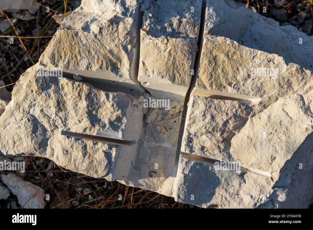 A block of limestone cut with a diamond blade, collecting ...