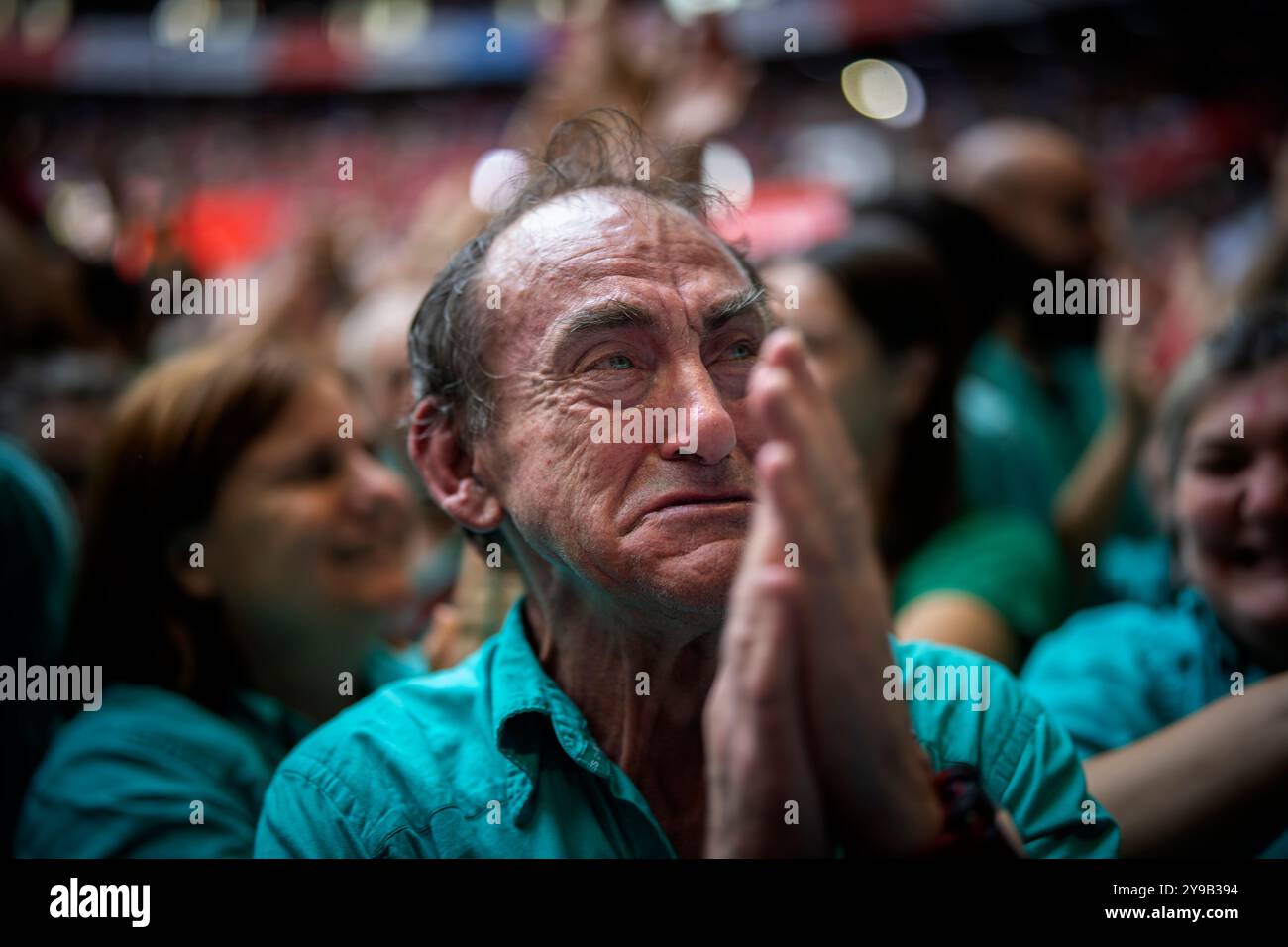 Juan Antonio Rodriguez, 72, reacts after performing next to members of ...