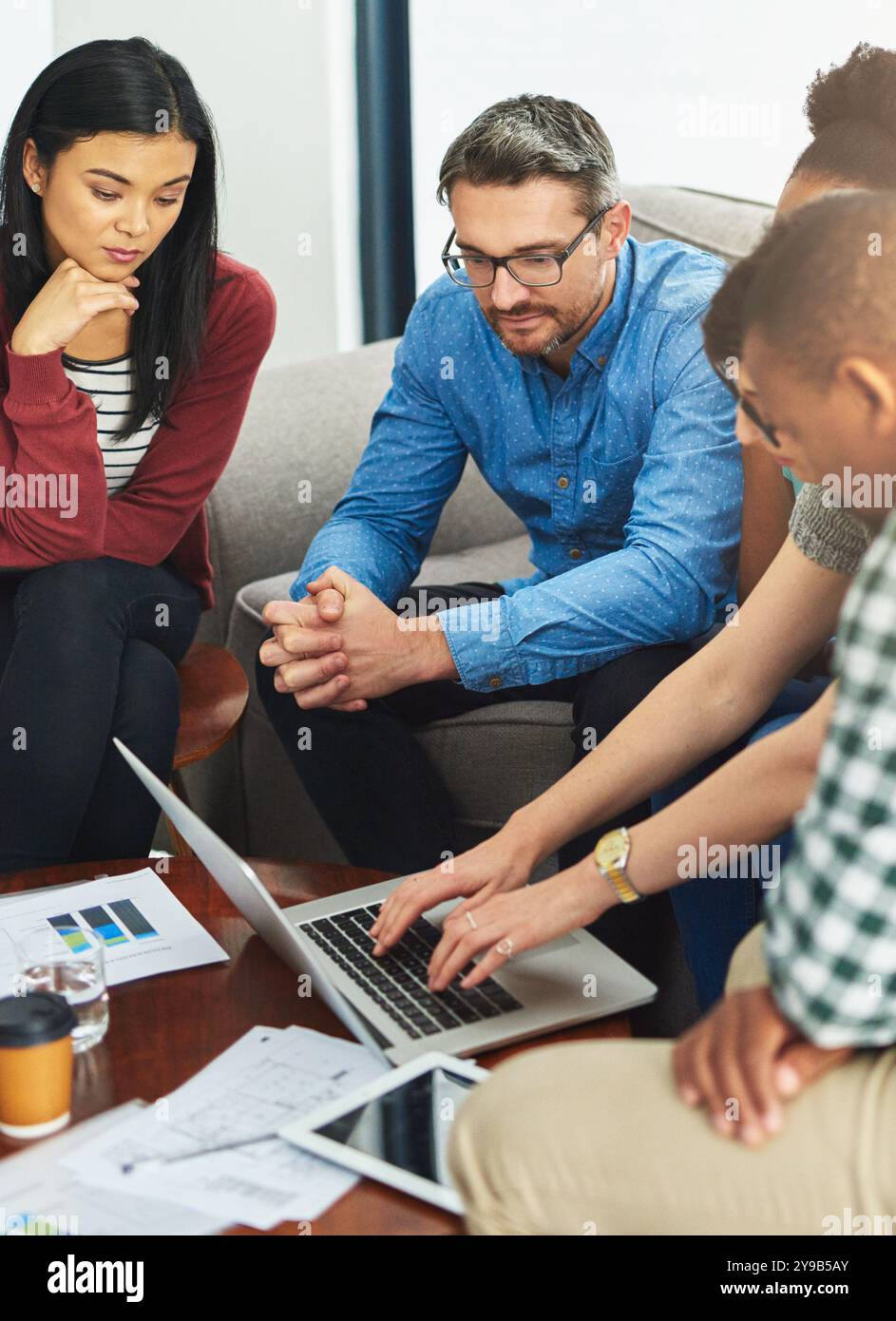 Documents, meeting and people with laptop in office for project information, review and IT ...