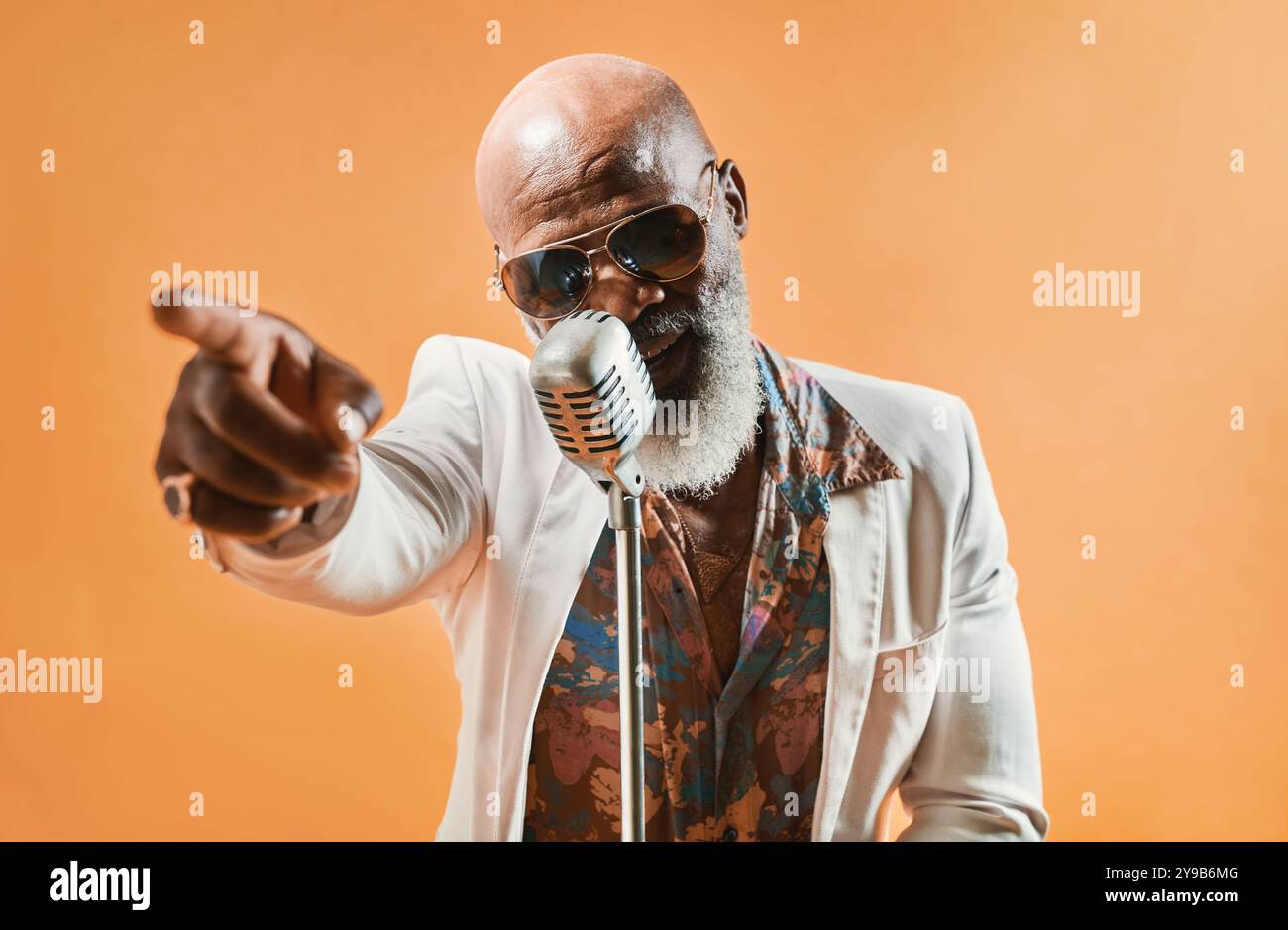 Singer, senior and black man with soul, point and old school music with ...